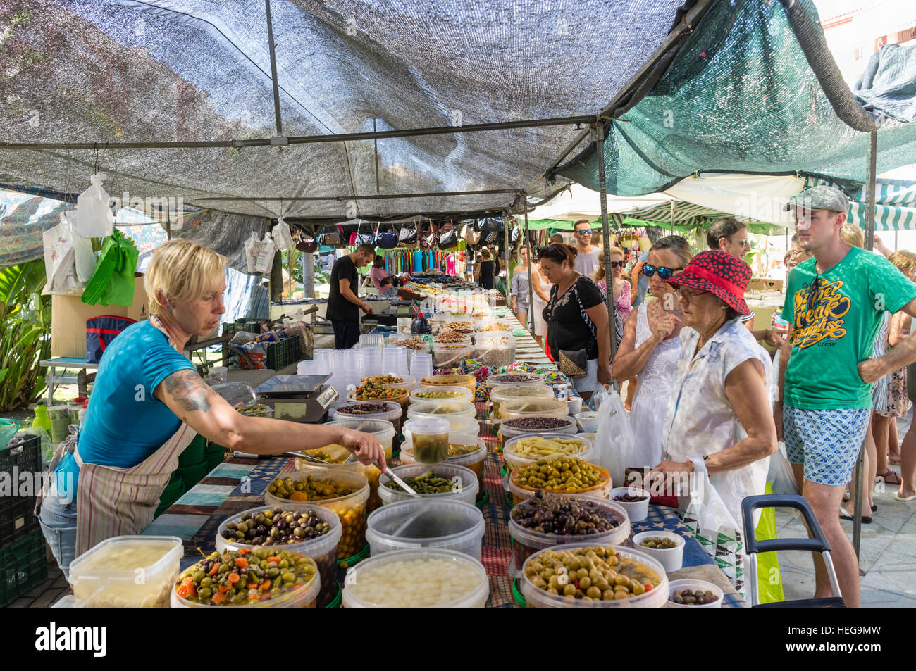Stall with varieties of olives and pickles at a street market in ...