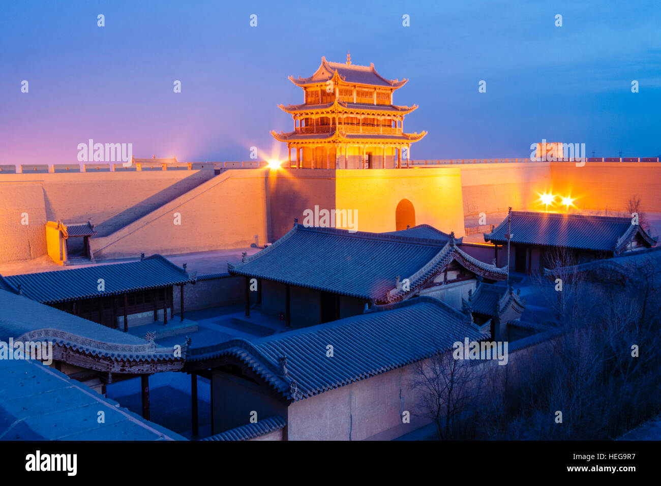 Jiayuguan fort illuminated at twilight at the western boundary of the ...