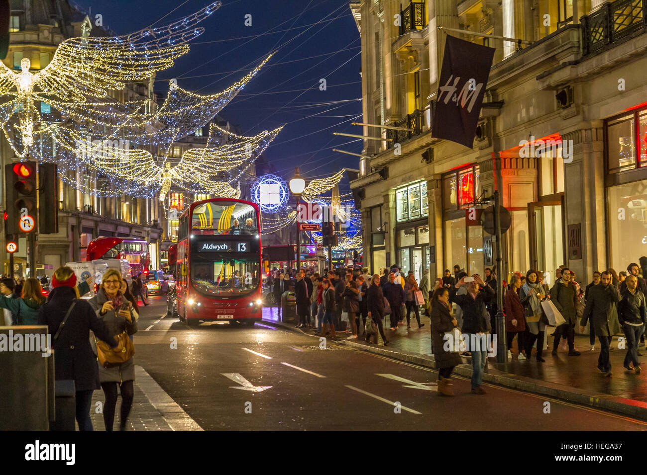 Crowds of Christmas shoppers walking along a busy Regent Street at ...