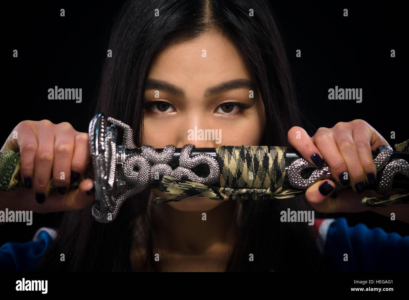 Asian lady sword in studio hi-res stock photography and images - Alamy