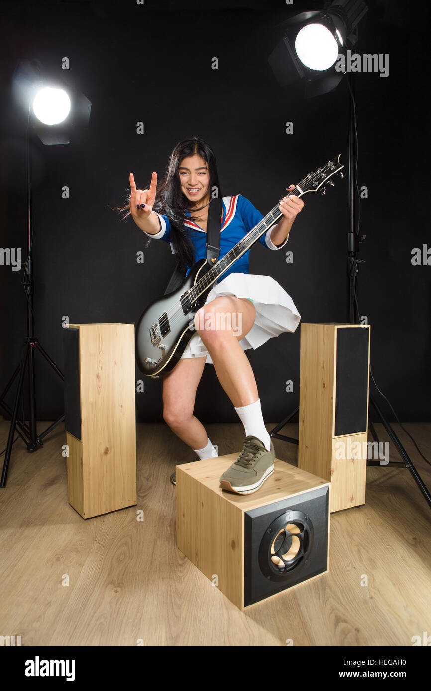 Asian rock star lady in studio Stock Photo - Alamy