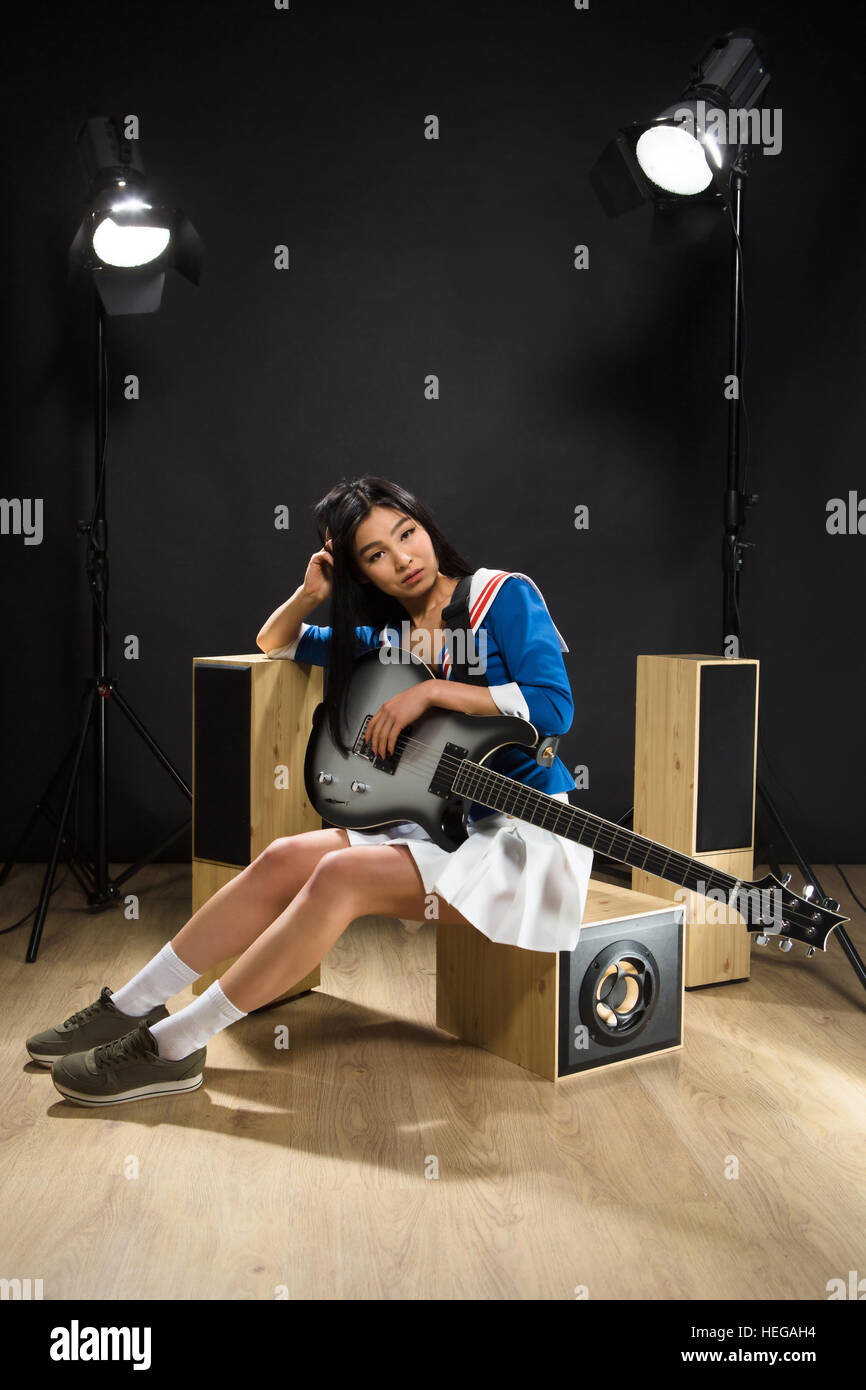 Asian rock star lady in studio Stock Photo - Alamy