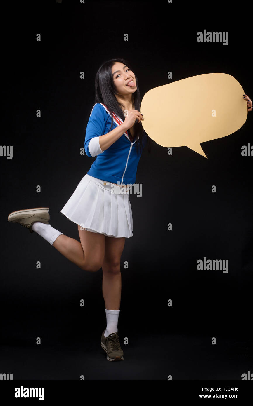 Asian woman posing with blank poster in studio Stock Photo - Alamy