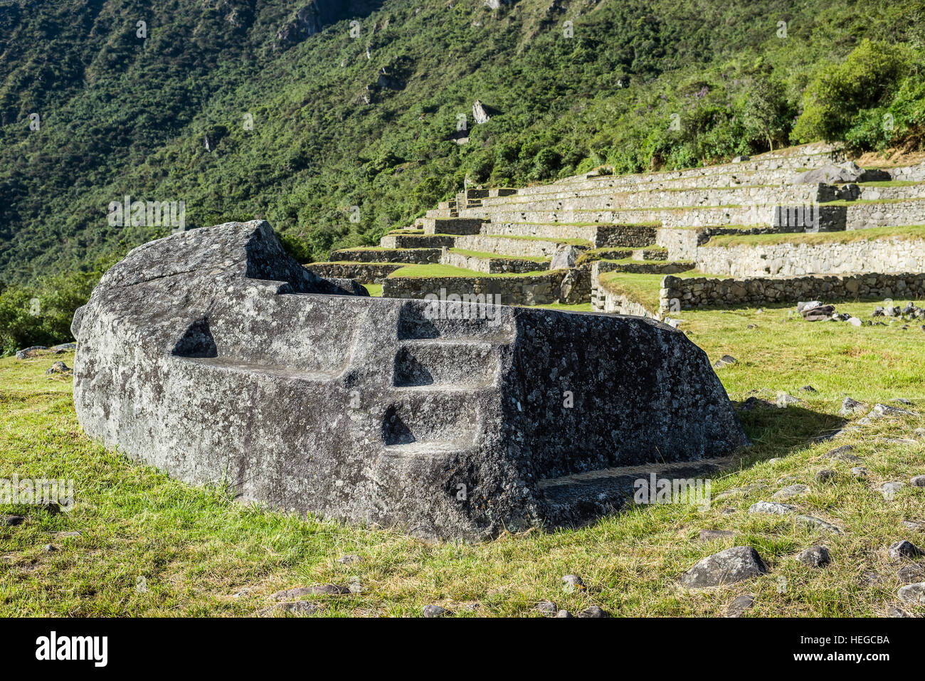 Mortuary rock at Machu Picchu, Incas ruins in the peruvian Andes at ...