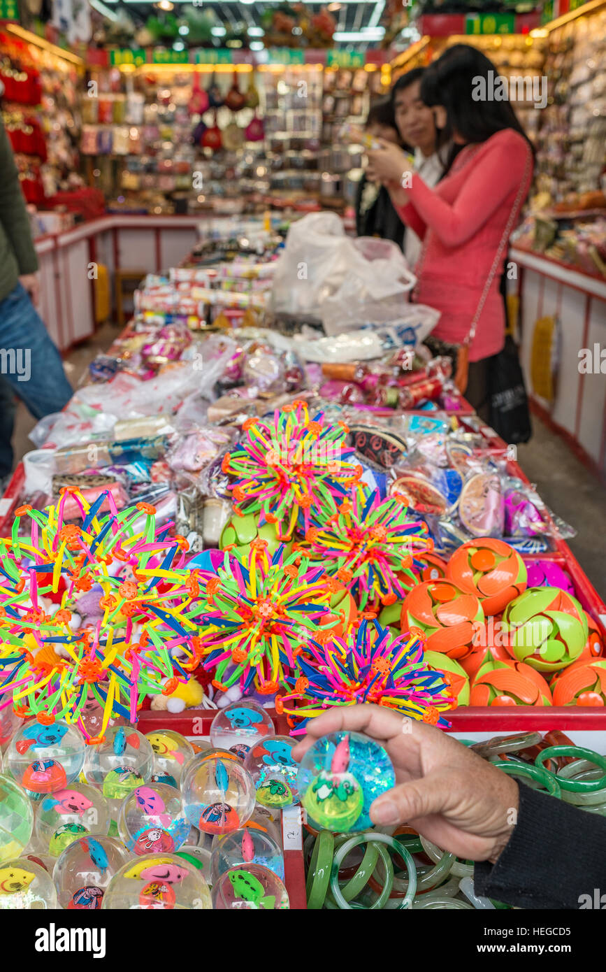 Shanghai, China - April 7, 2013: people in a souvenirs store in gucheng ...