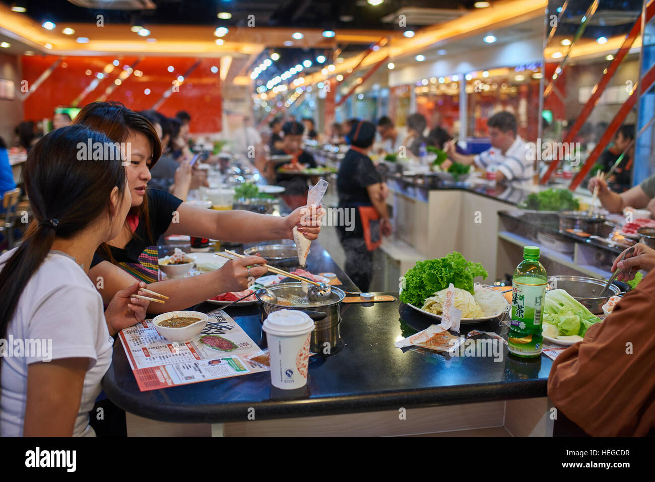 Beijing , China - September 24, 2014: people eating Chinese Hot pot in ...