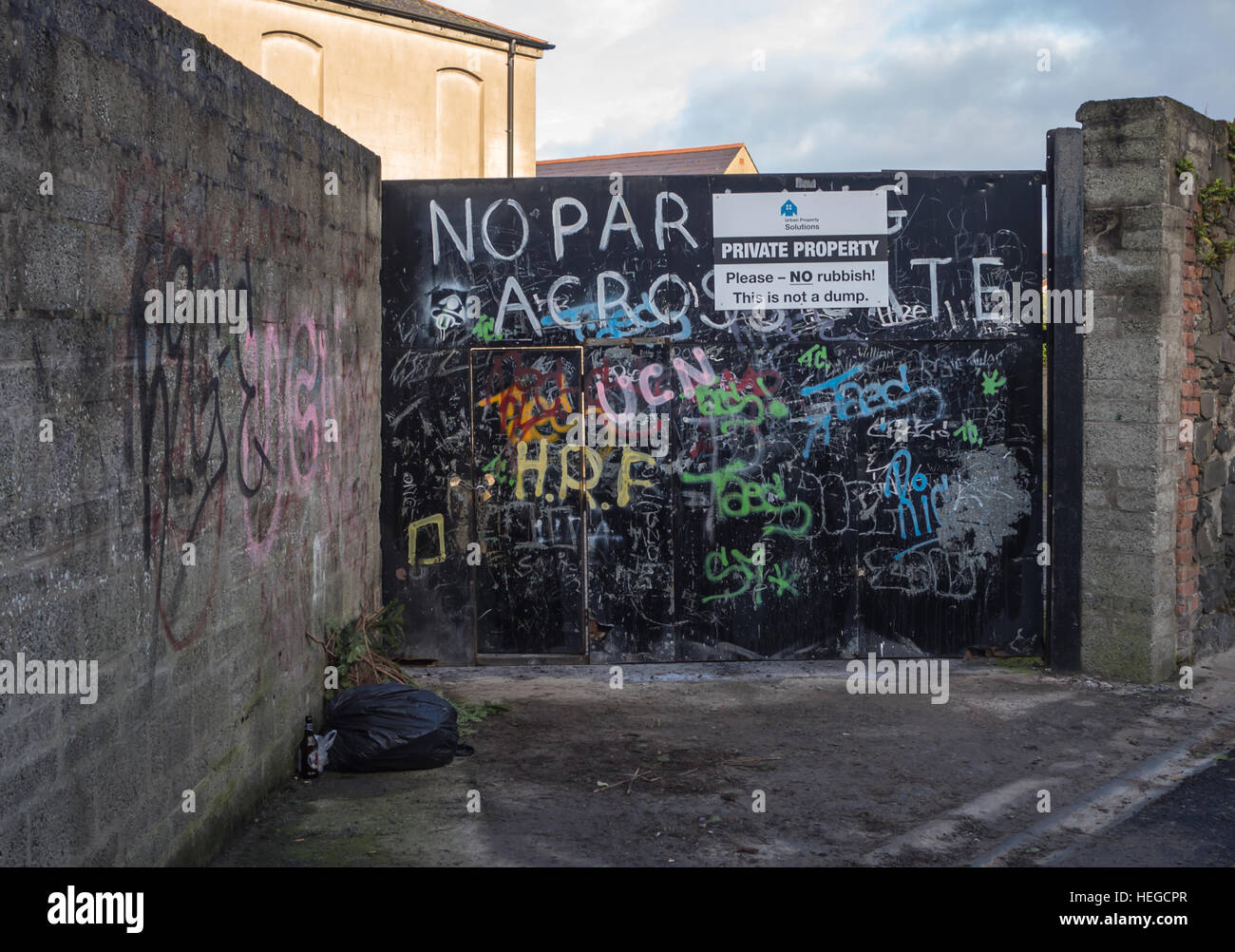 Graffiti on a gate Stock Photo - Alamy
