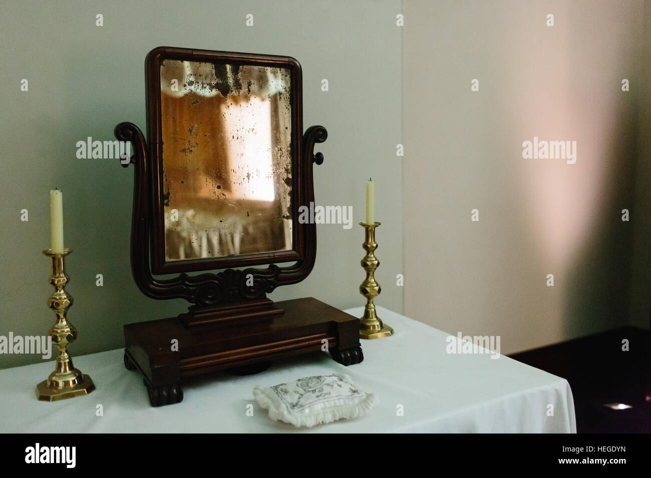 An old mirror and dressing table in the main bedroom at Elizabeth Farm ...