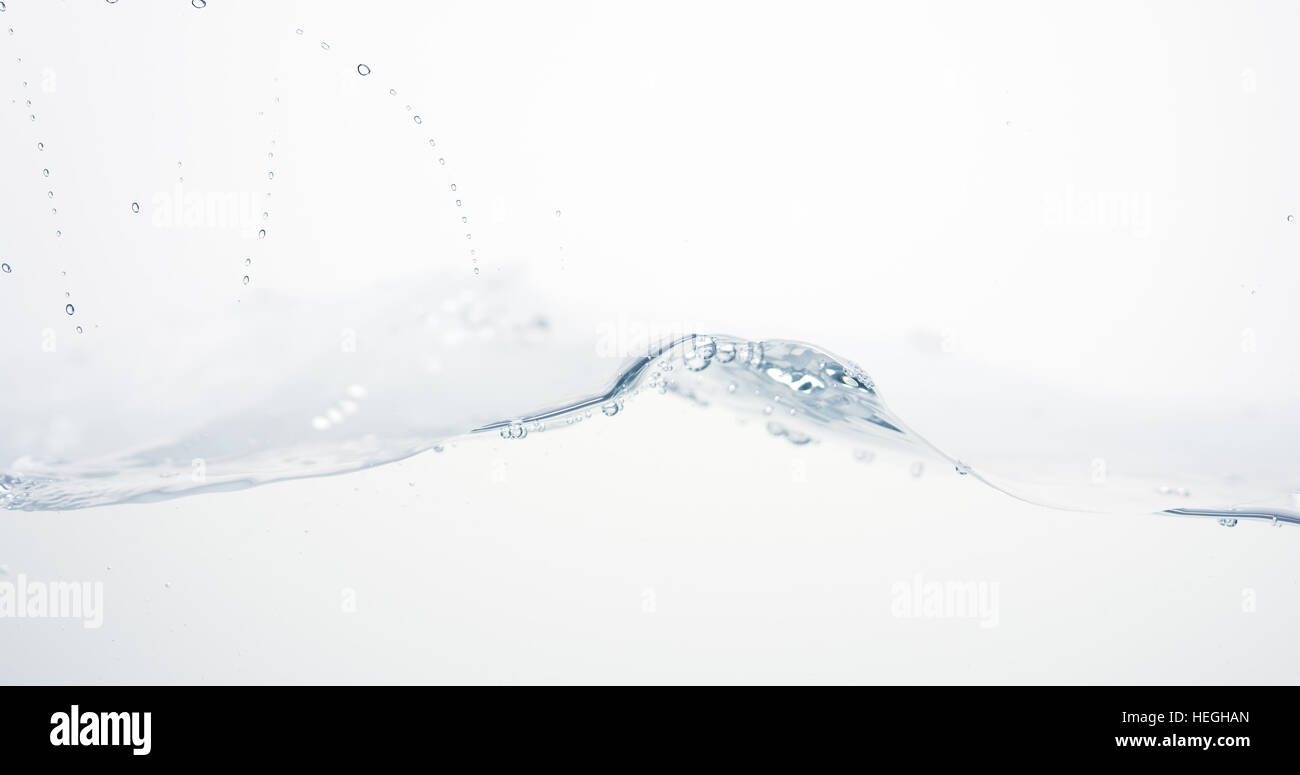 clear blue water waves and splashes side view Stock Photo - Alamy