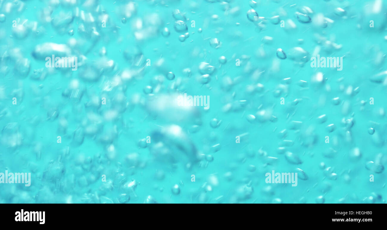 underwater air bubbles in blue water pouring Stock Photo - Alamy