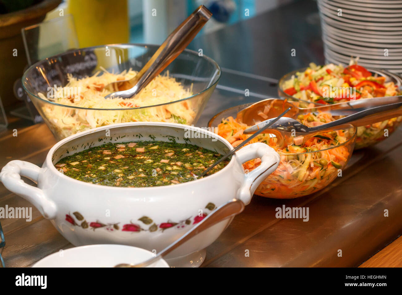 Bowls with various food in self service restaurant, closeup Stock Photo ...