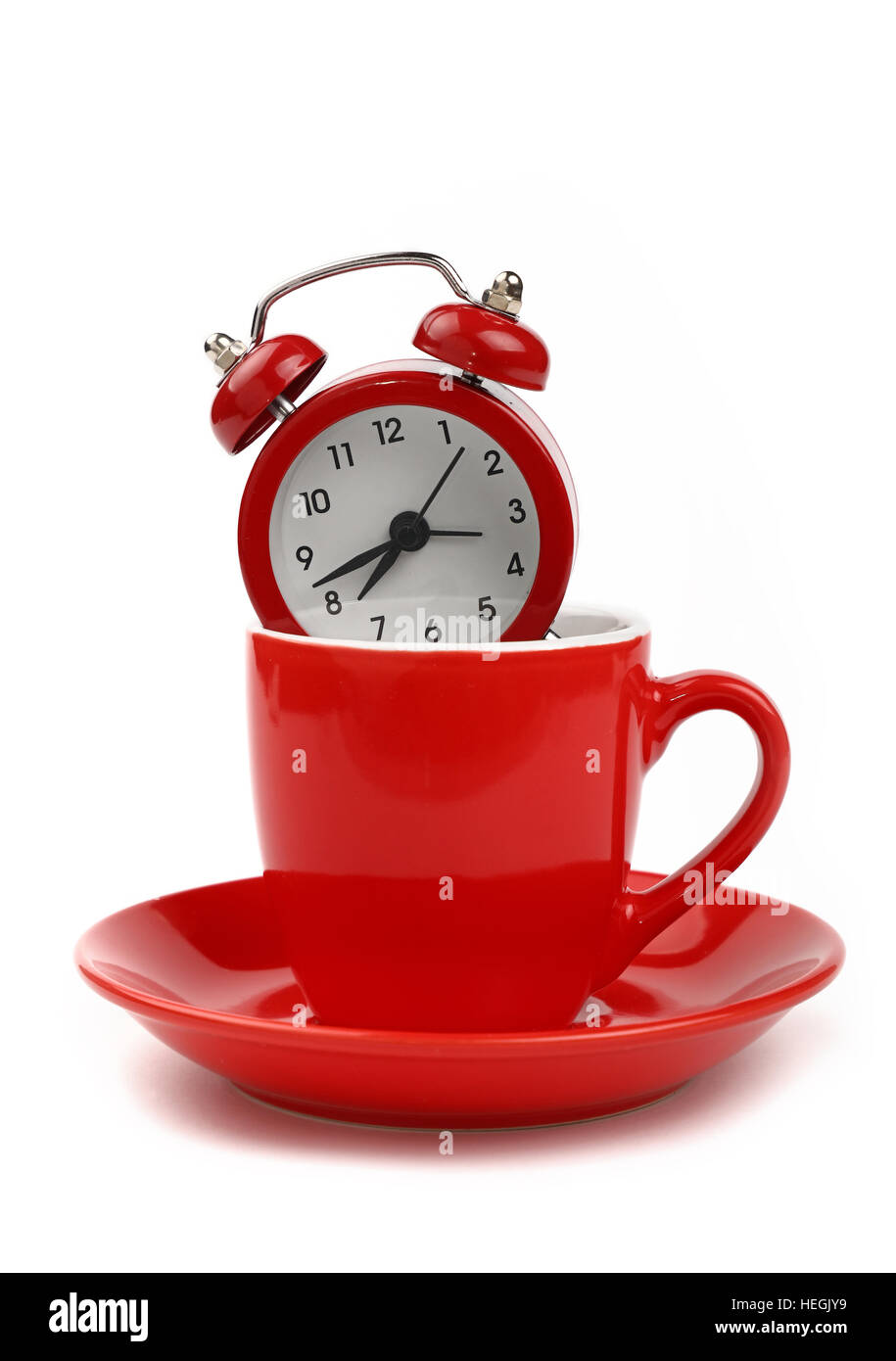 Coffee time concept, small red metal alarm clock with red bells in ...