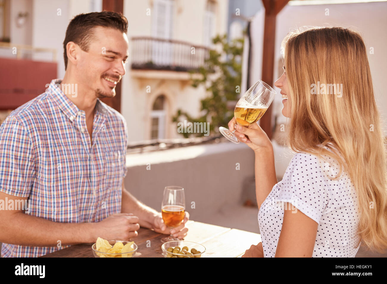 Couple sitting across from each other hi-res stock photography and ...