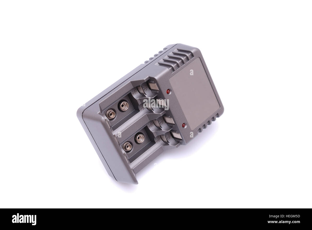 Accu battery charger on a white background Stock Photo - Alamy