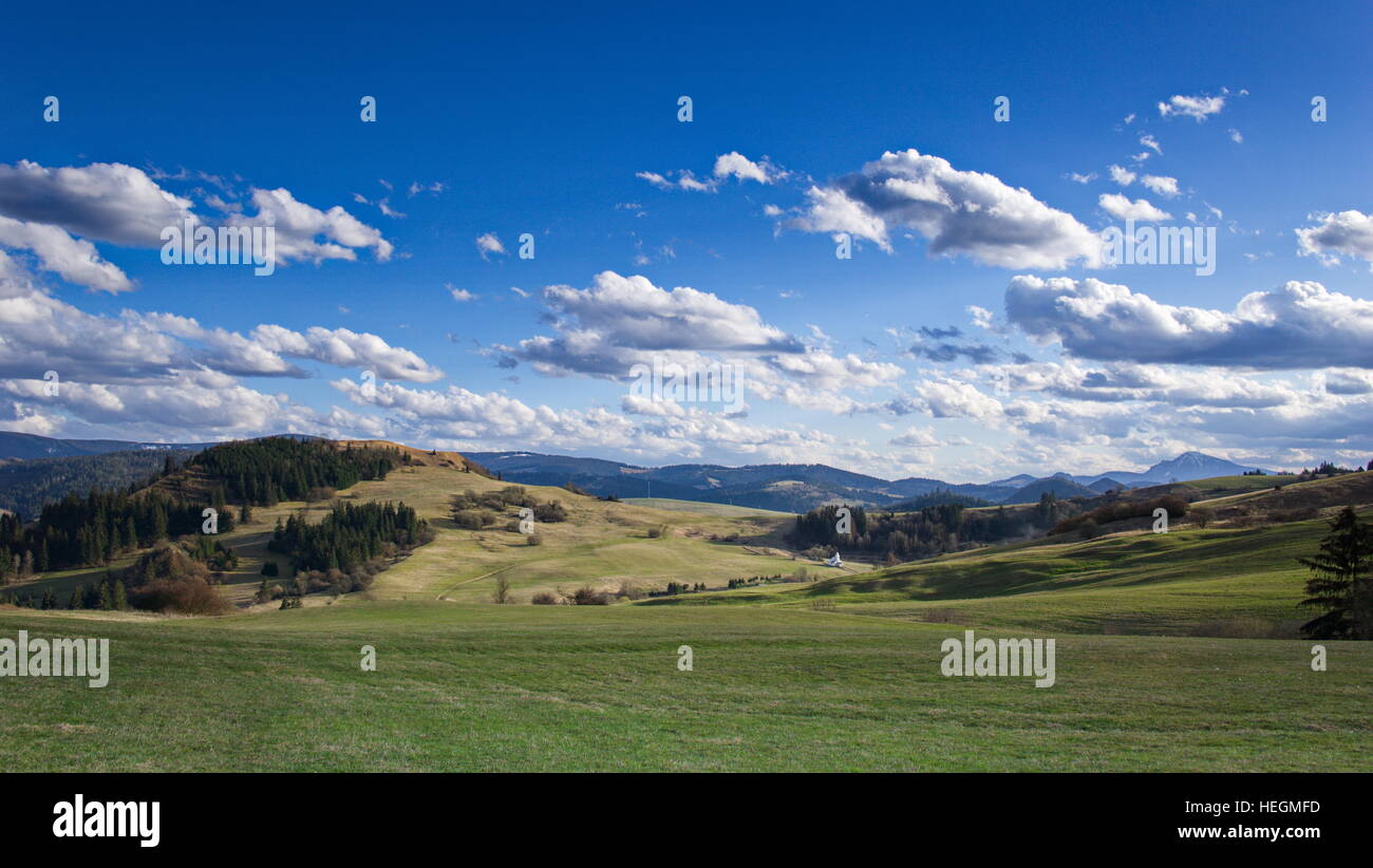 Spring landscape with hill and sky Stock Photo - Alamy