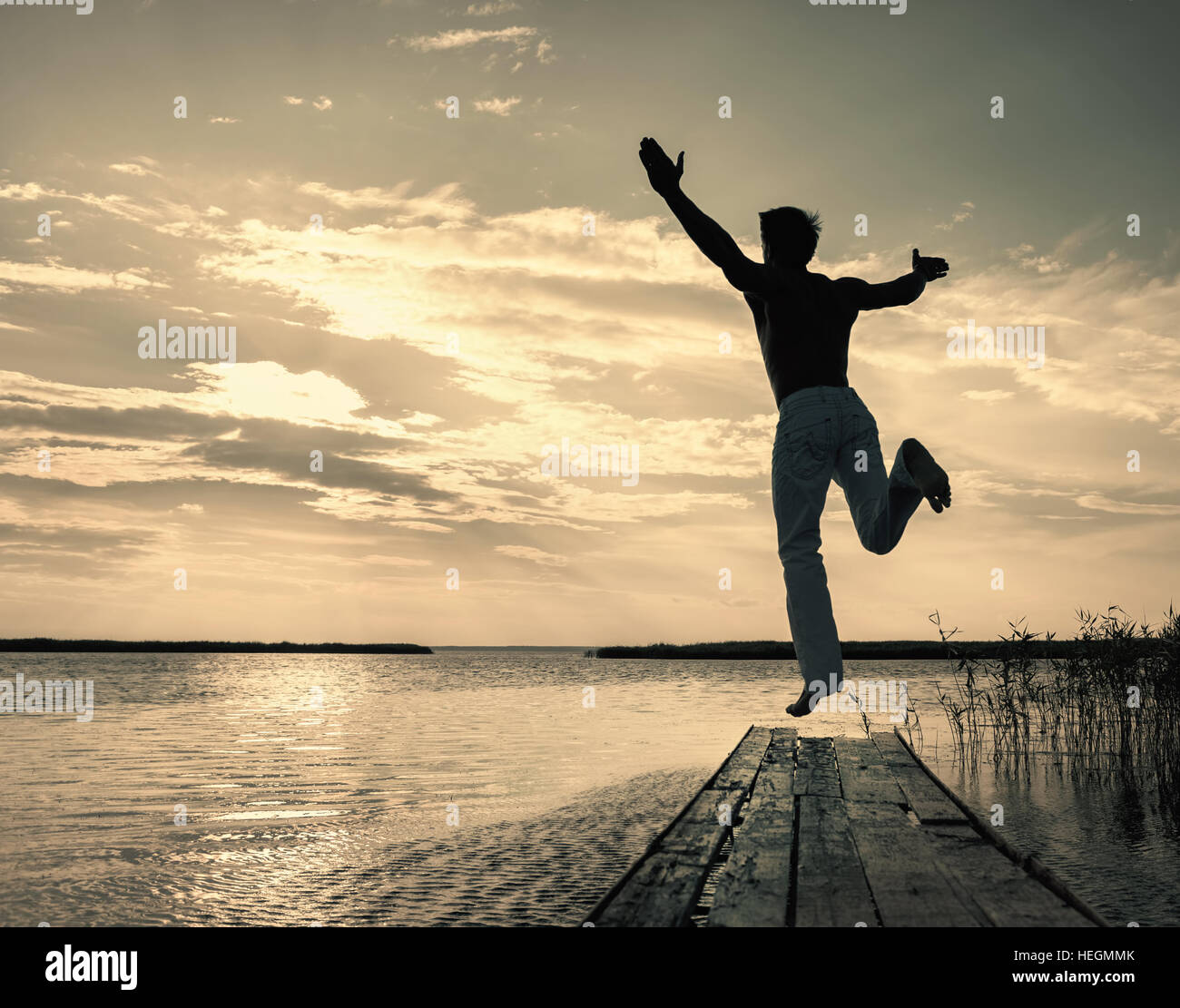 Jumping off the pier hi-res stock photography and images - Alamy