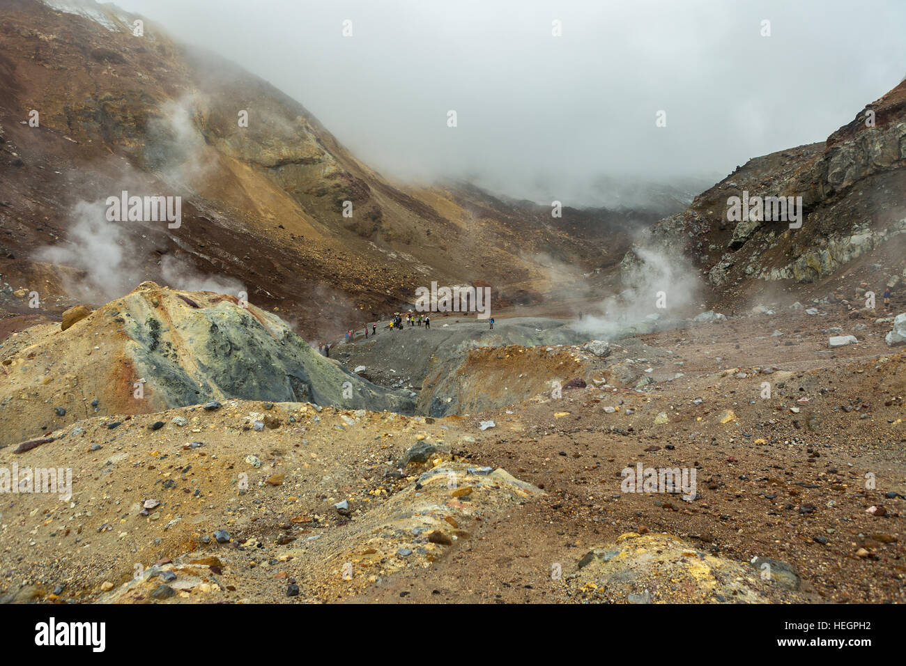 Climbing to active volcano Mutnovsky on Kamchatka Stock Photo - Alamy
