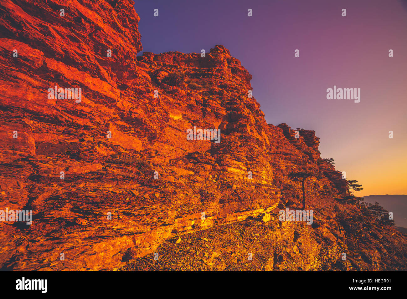Mountain range at sunset Stock Photo - Alamy