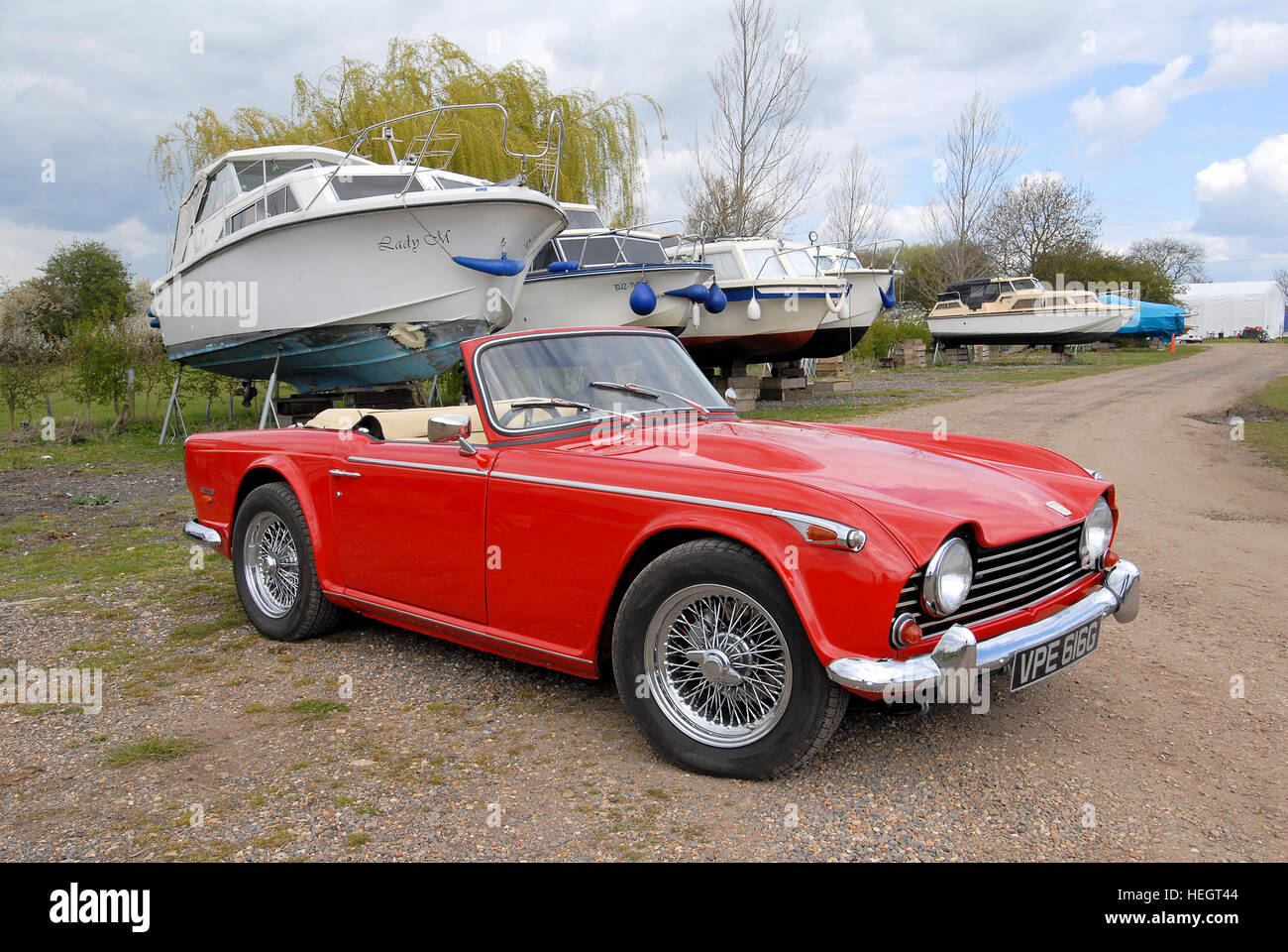 Red Triumph TR5 in boat yard Stock Photo - Alamy