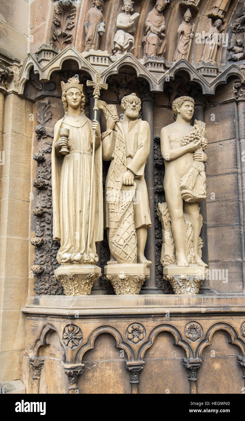 Religious statues in the doorway of the Basilica in Trier Stock Photo ...