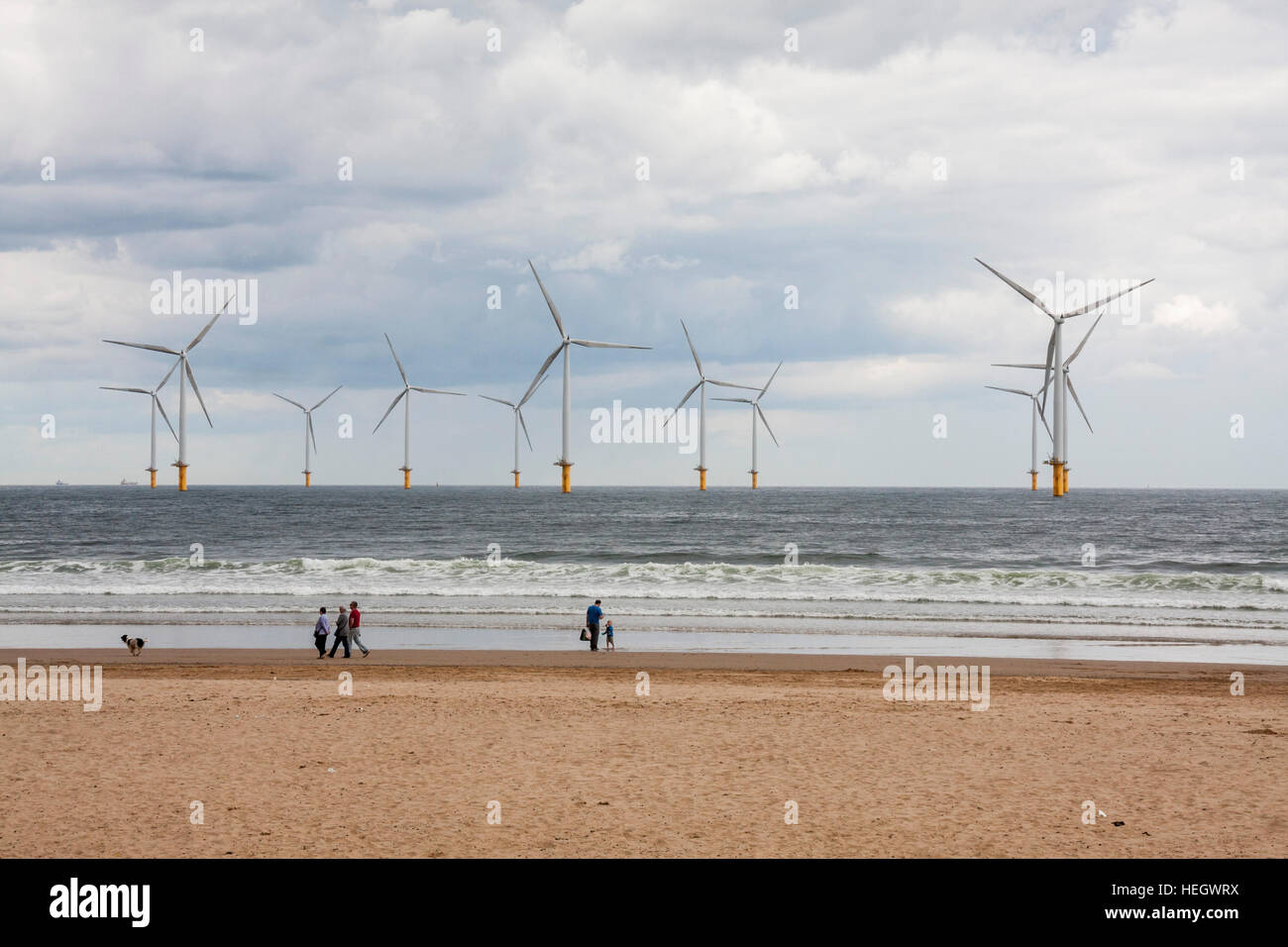 Redcar beach on the north east coast of England with the wind turbines ...