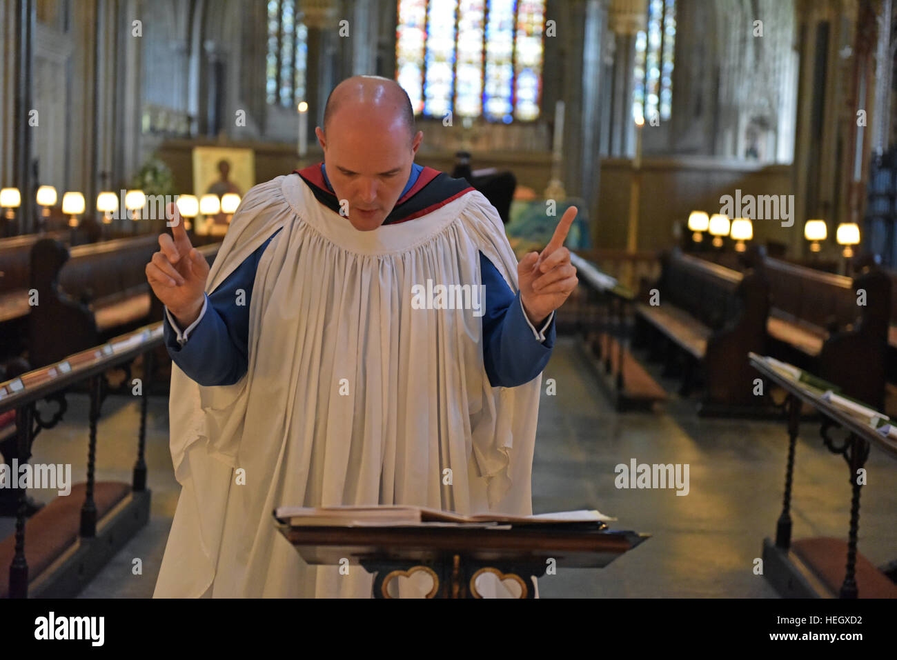 Choirmaster from Wells Cathedral Choir rehearse for evensong chorister ...