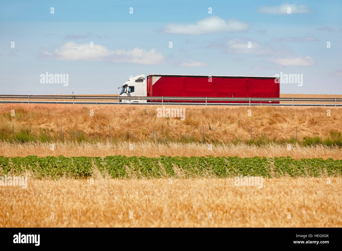 Red heavy truck on the road. Delivery cargo logistic. Horizontal Stock ...
