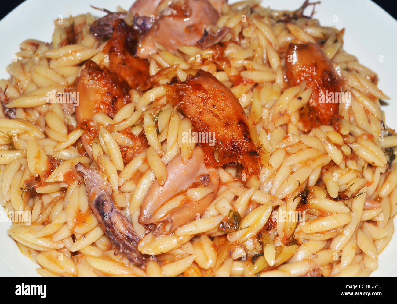 cuttlefish and squid with pasta - greek mediterranean food Stock Photo ...