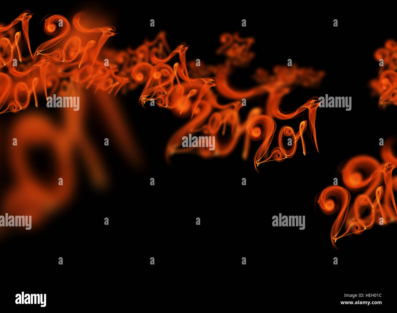 Happy new year 2017 flying digits numbers written with fire flame light ...
