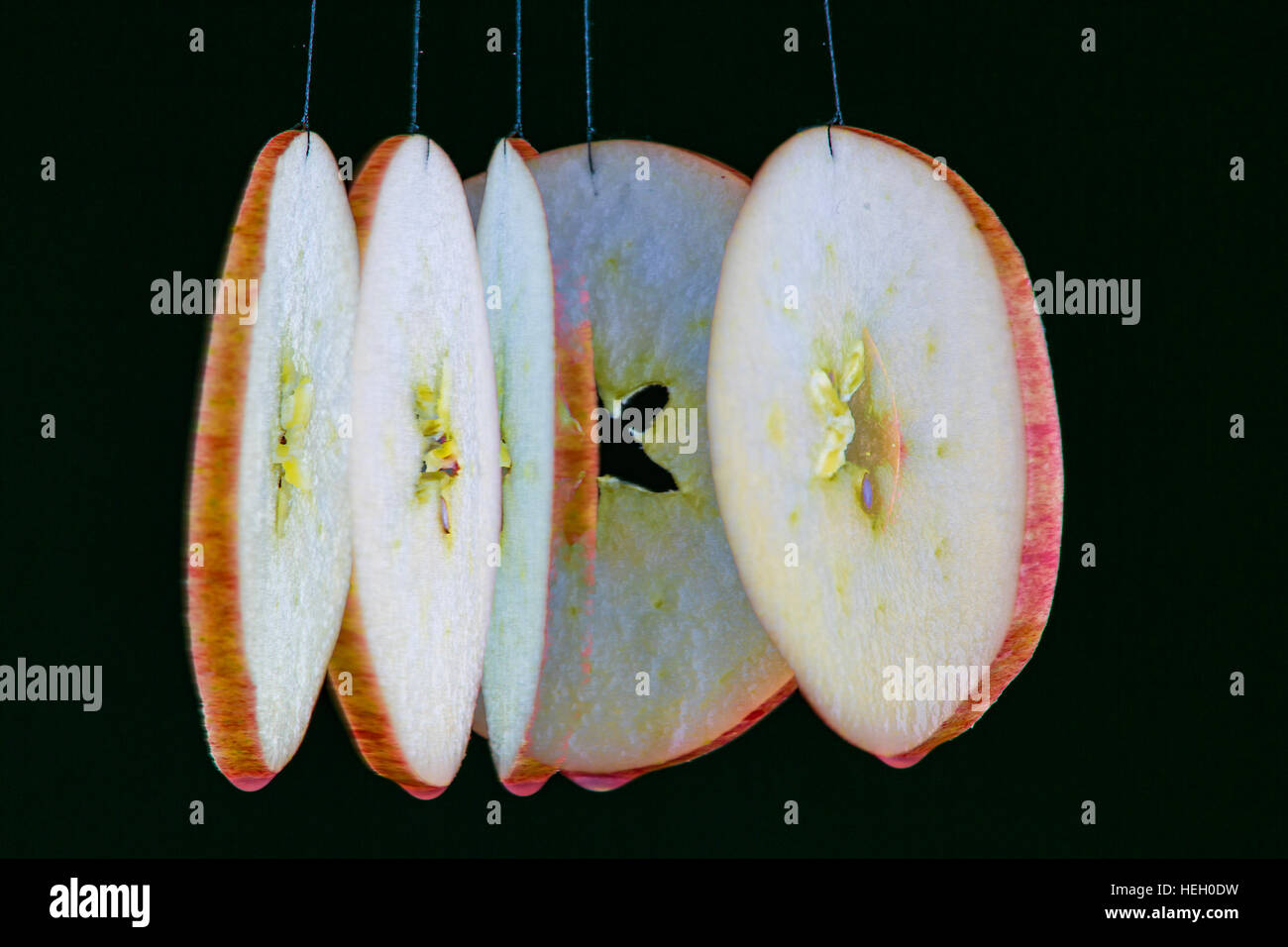 Slice of apple. Multiple exposure. Action image Stock Photo - Alamy