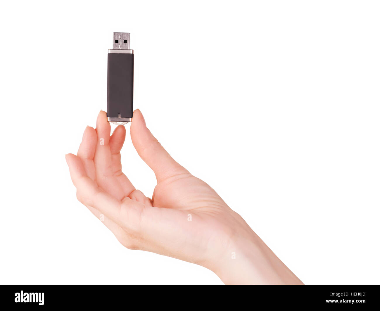 Woman hand holding flash pc card. Isolated on white, clipping path ...