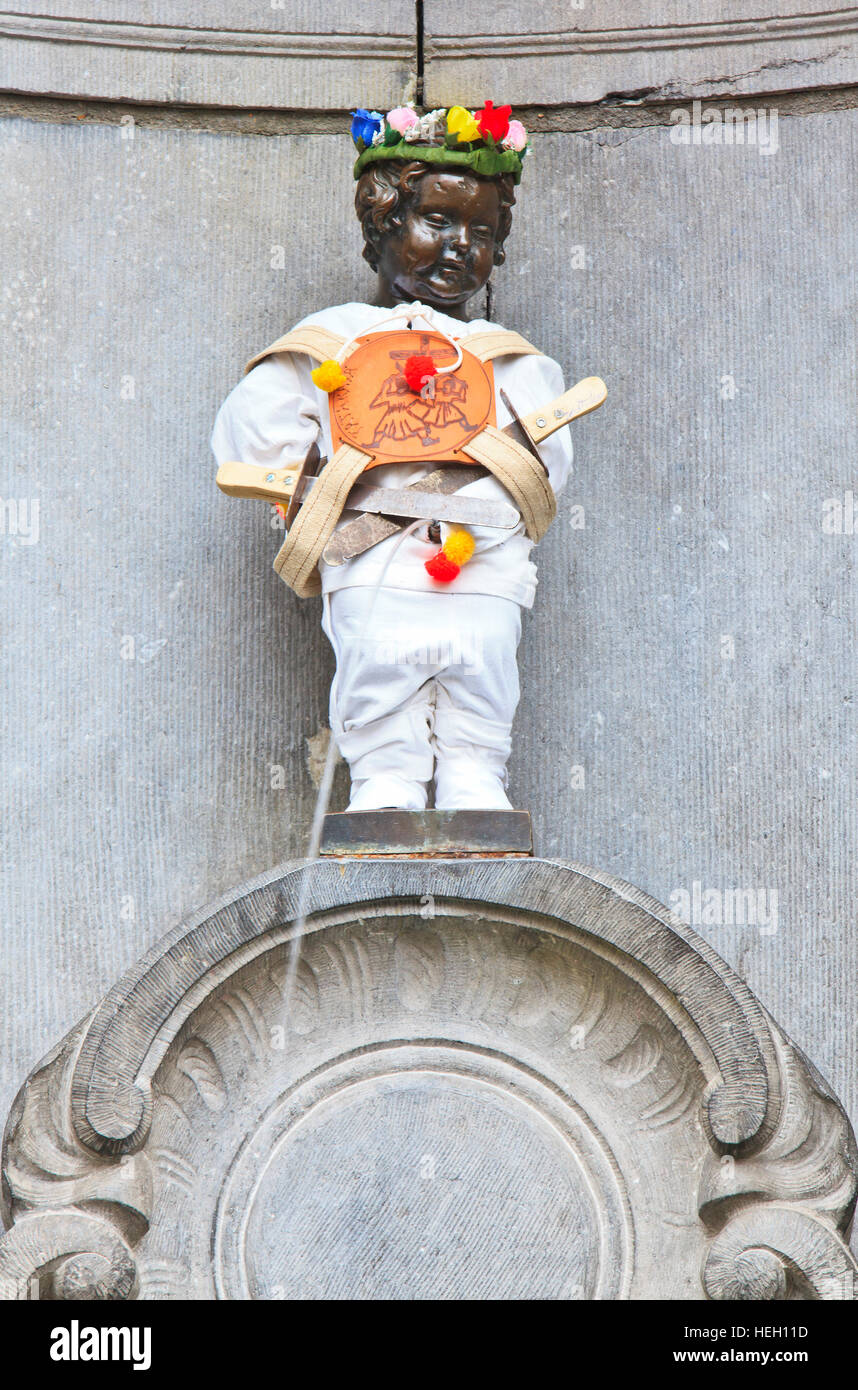 Manneken Pis dressed in a traditional costume of the Sagra del Tataratà from Siciliy, Italy ...