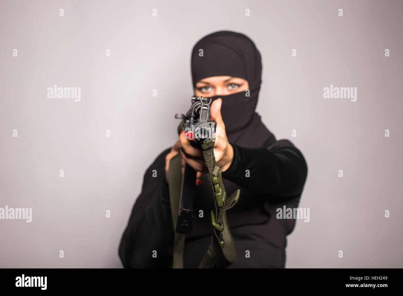 Muslim gun woman hi-res stock photography and images - Alamy