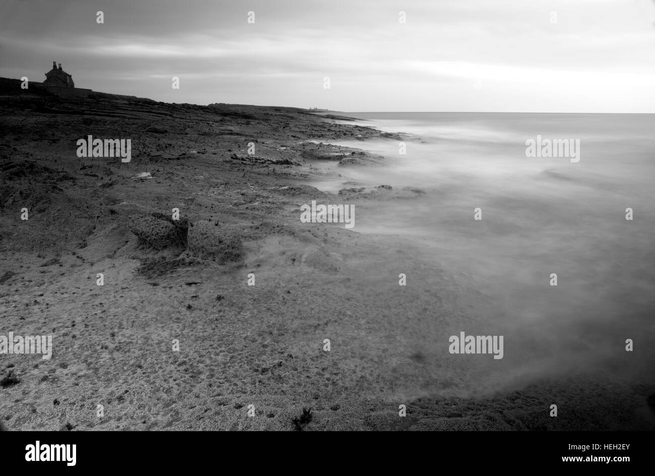 Distant view of dunstanburgh castle hi-res stock photography and images ...