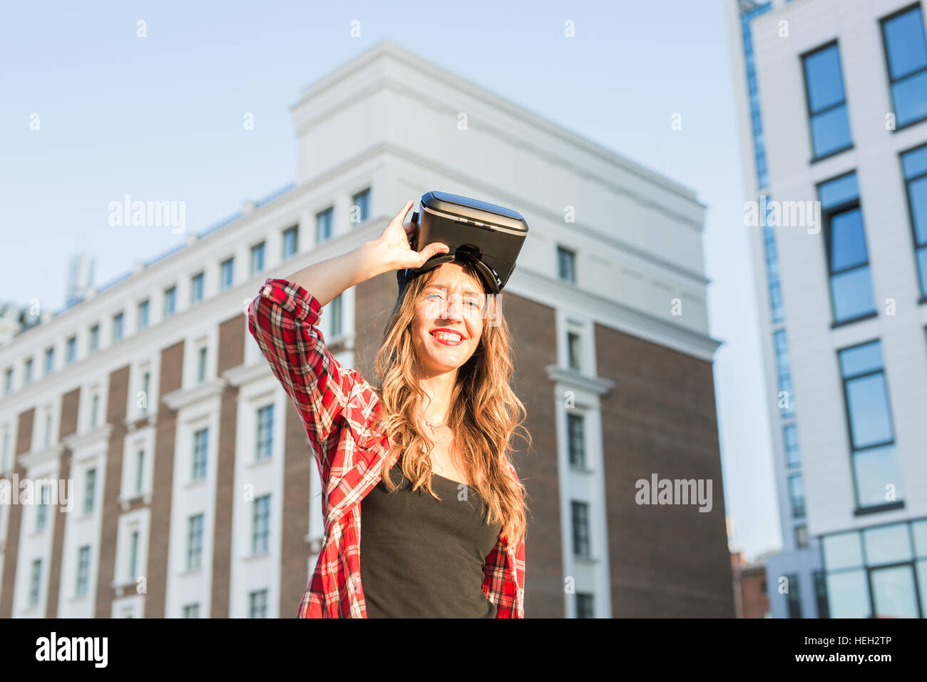 Young Beautiful Woman Using VR Outside Stock Photo - Alamy