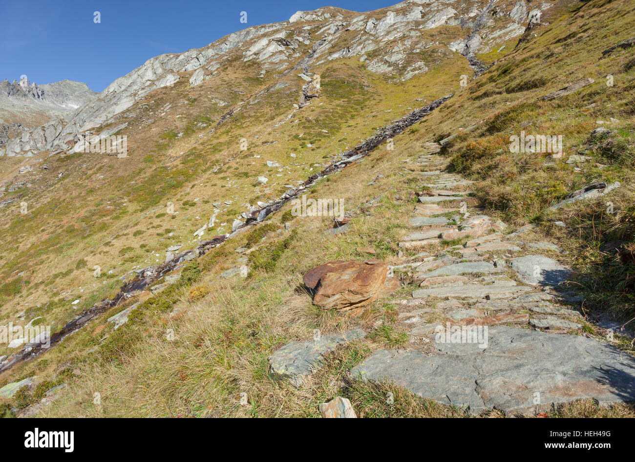 trekking in the Italian Alps; it's autumn with no people around Stock ...