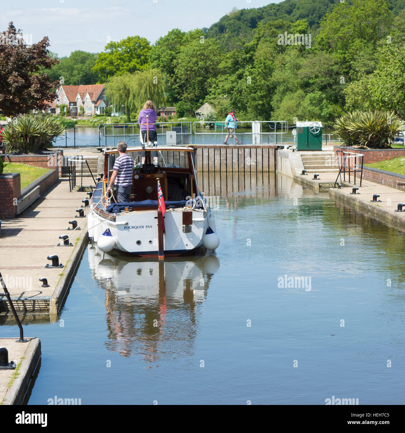 Motor boat passing through Hambleden lock, River Thames, Berkshire ...