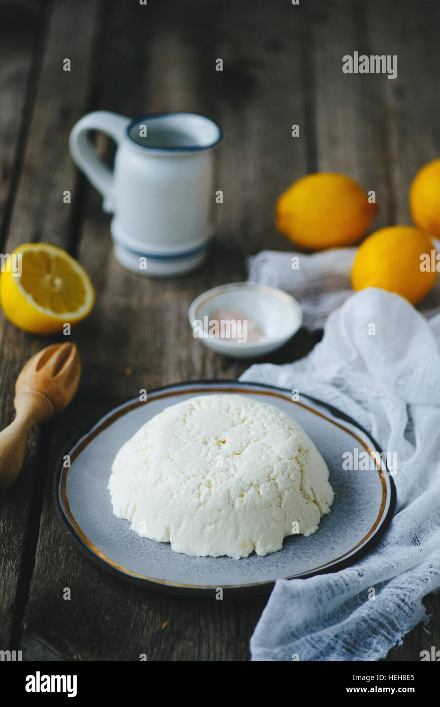Homemade ricotta on a wooden table Stock Photo - Alamy