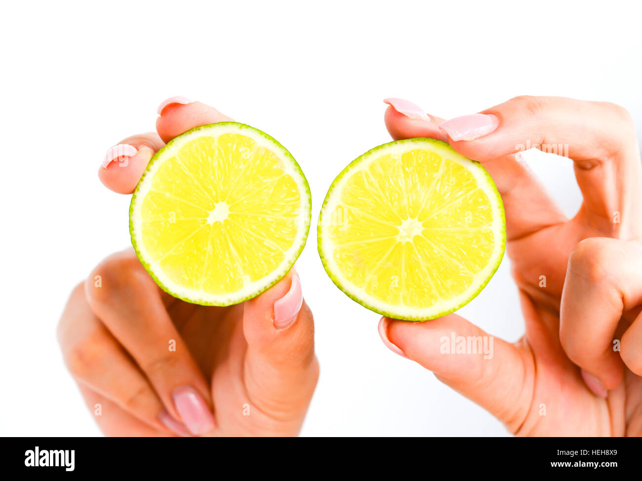 Hand holding lemon slice citrus hi-res stock photography and images - Alamy