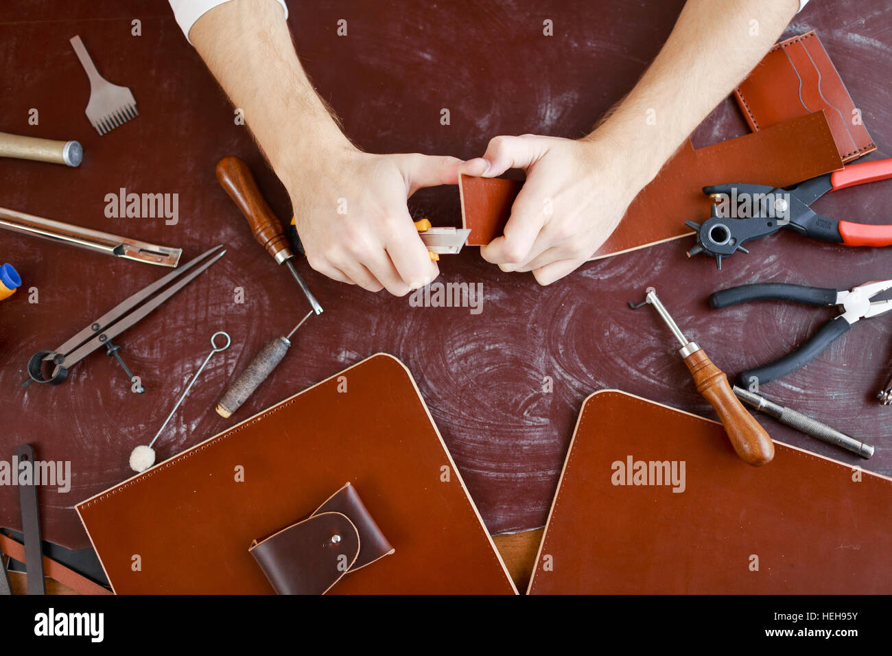 Tannery equipment and human hands during work Stock Photo - Alamy