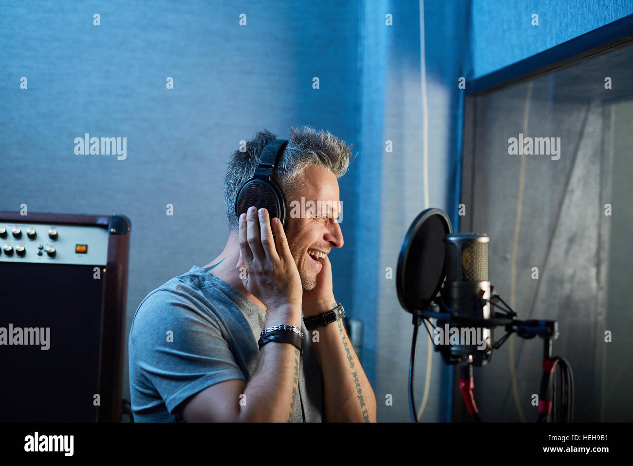 Professional singer practicing song recording in audio studio Stock ...