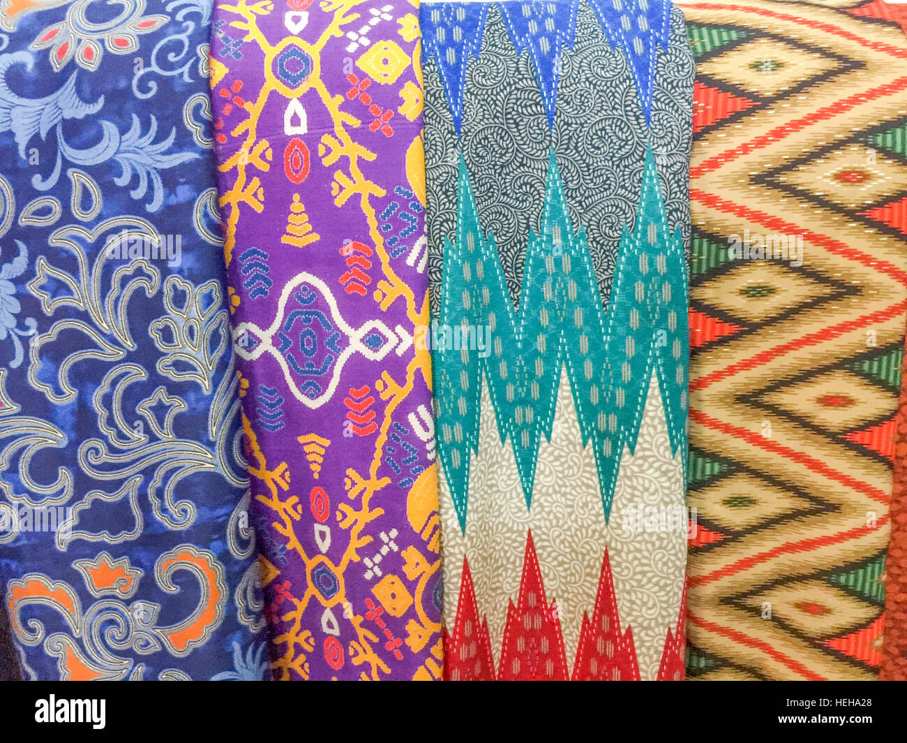 Variety of colourful fabric on display Stock Photo - Alamy