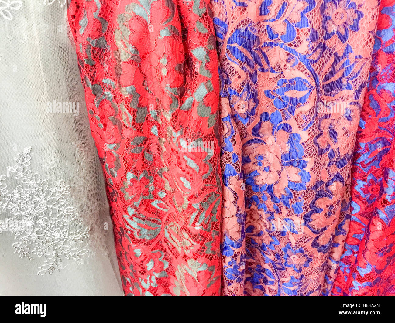 Variety of colourful fabric on display Stock Photo - Alamy