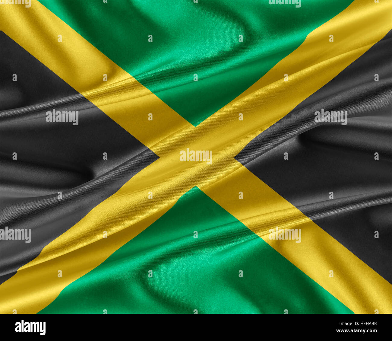 Jamaica flag with a glossy silk texture Stock Photo - Alamy