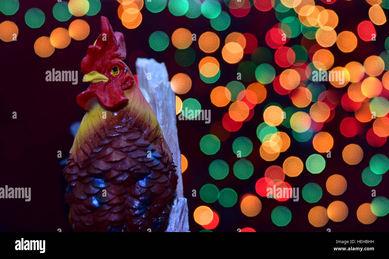Homemade Christmas toy rooster. Tinted. Top view with copy space Toy ...