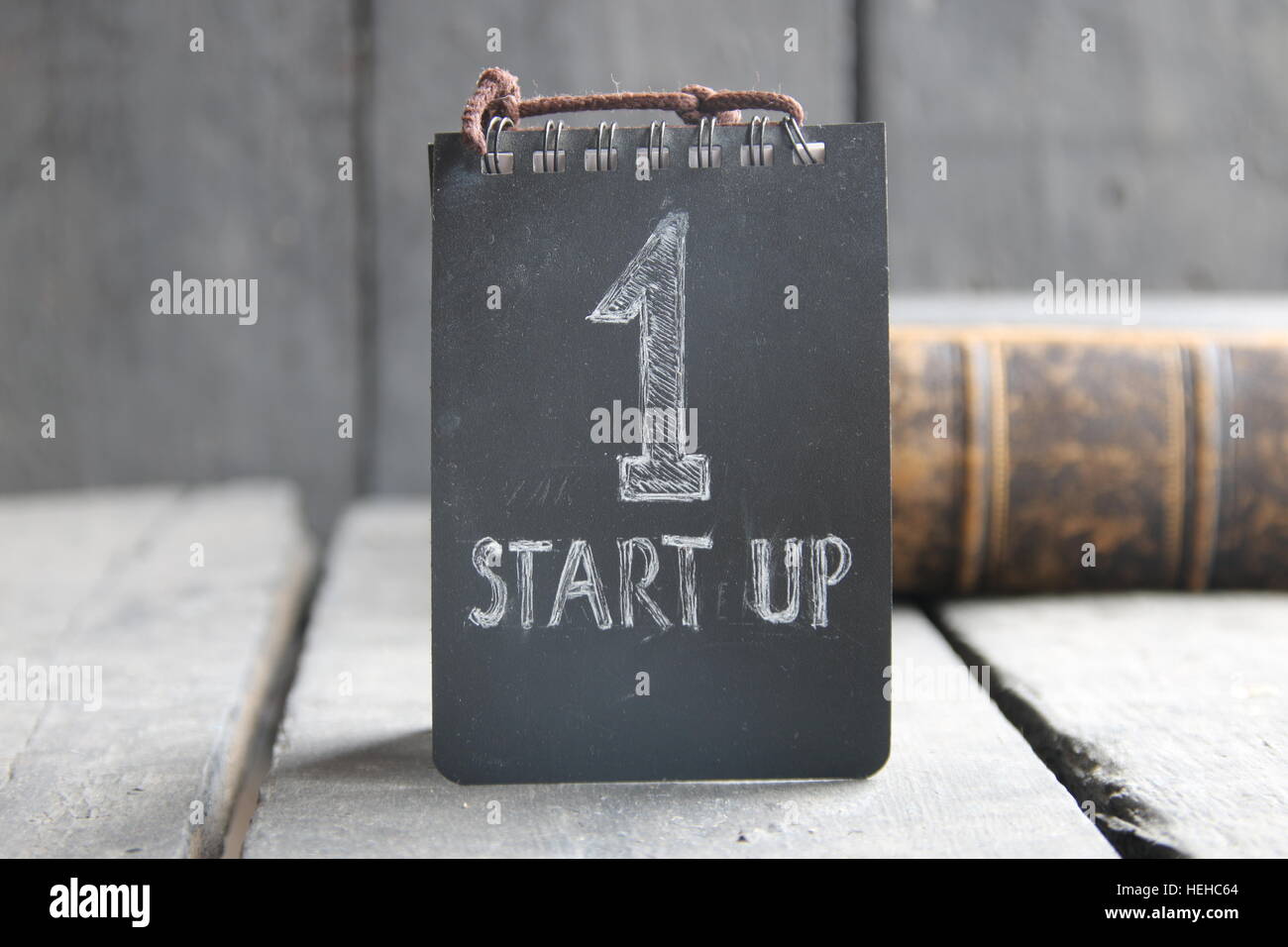 startup project concept, tag and book Stock Photo - Alamy