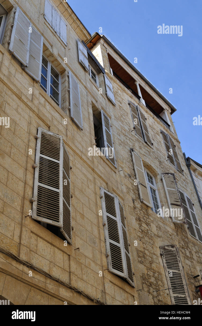 Typical French shuttered windows on a building in Auch, France Stock ...