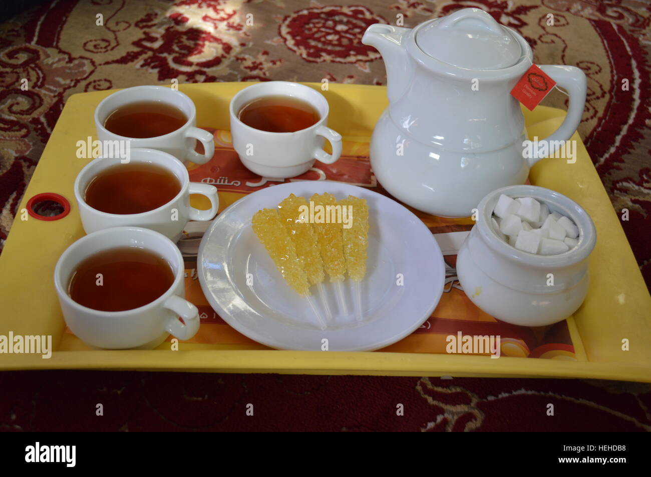 A tray of Persian tea and rock candy Stock Photo - Alamy