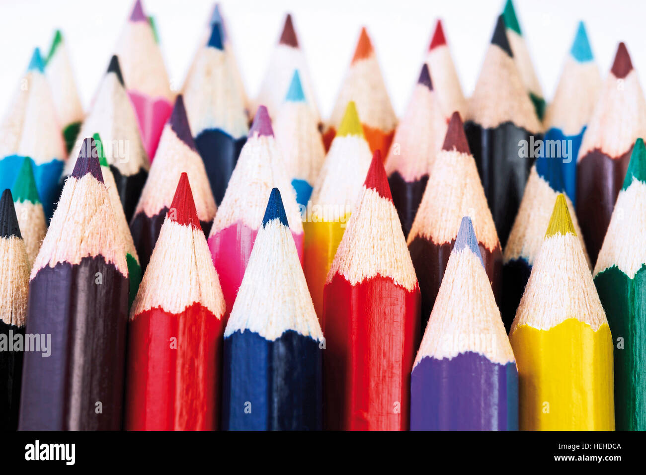 Sharpened pencil crayons, colouring pencils in rows Stock Photo - Alamy