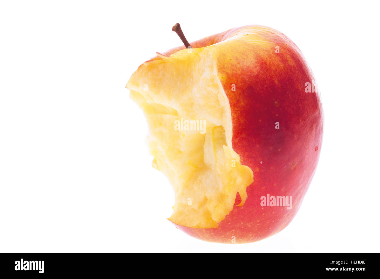 Apple, bitten into Stock Photo - Alamy